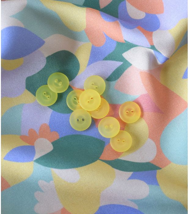 Bouton couture rond 15mm translucide jaune citron