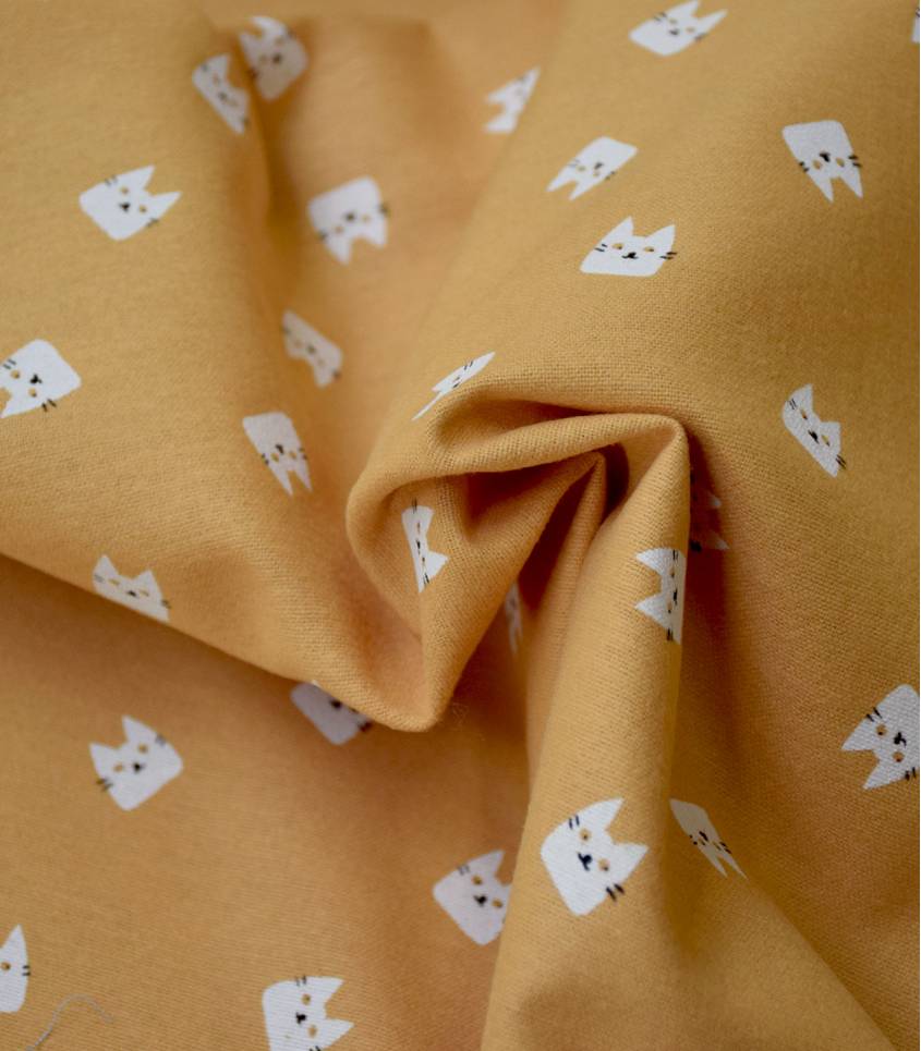 Tissu flanelle de coton - Cats ocre Tissu flanelle de coton - Cats ocre